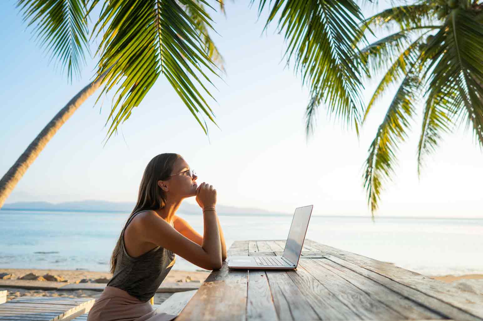 Working While You Travel: How to Achieve It - AnnMarie John